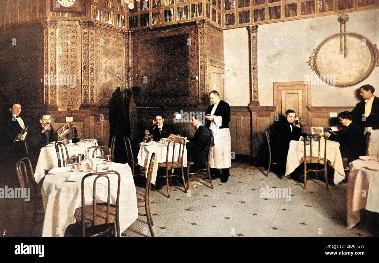 Restaurant scene from 1910 showing one diner using a telephone at his ...