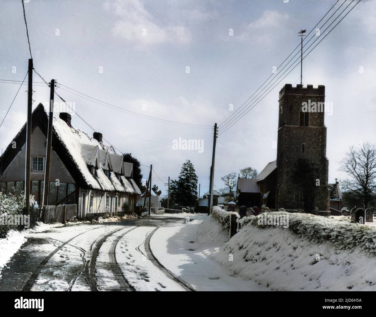 A winter scene beside the church at Tattingstone, a village between ...