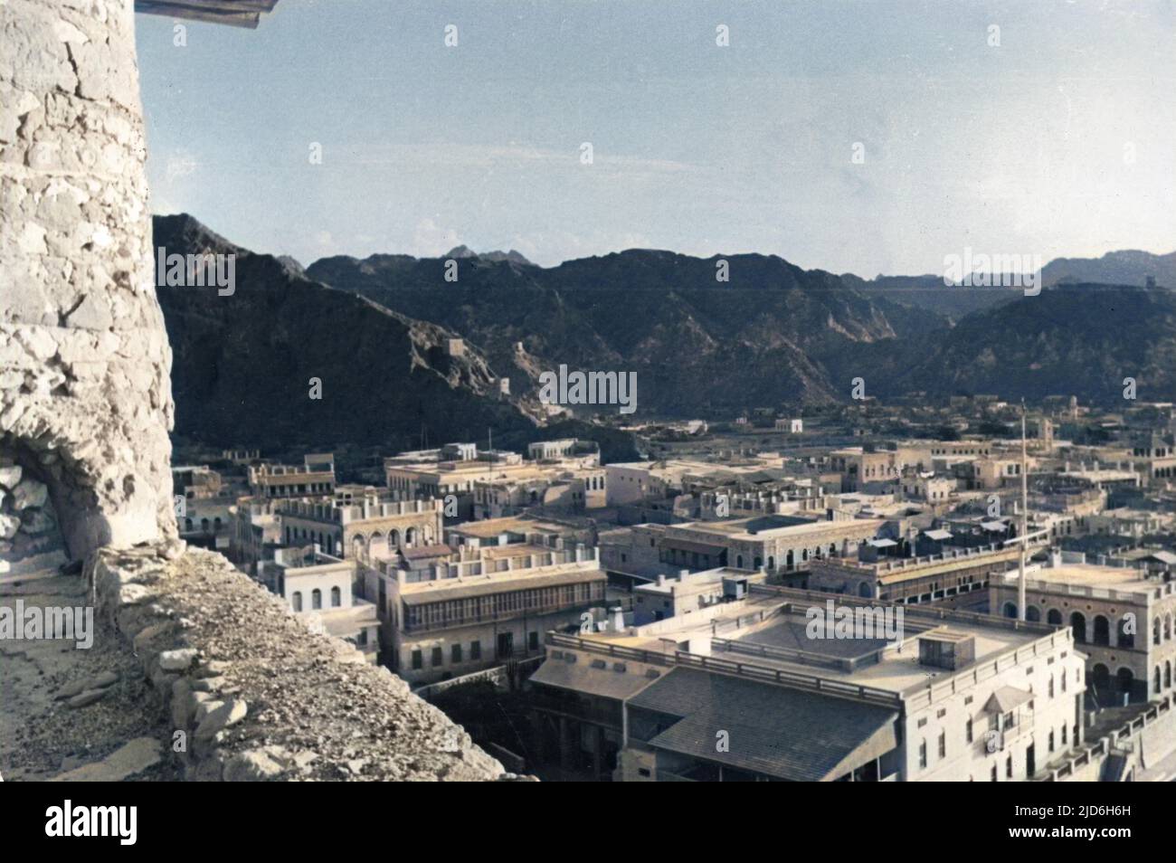 The white palaces of Muscat, Oman, are closed in on three sides by the ...