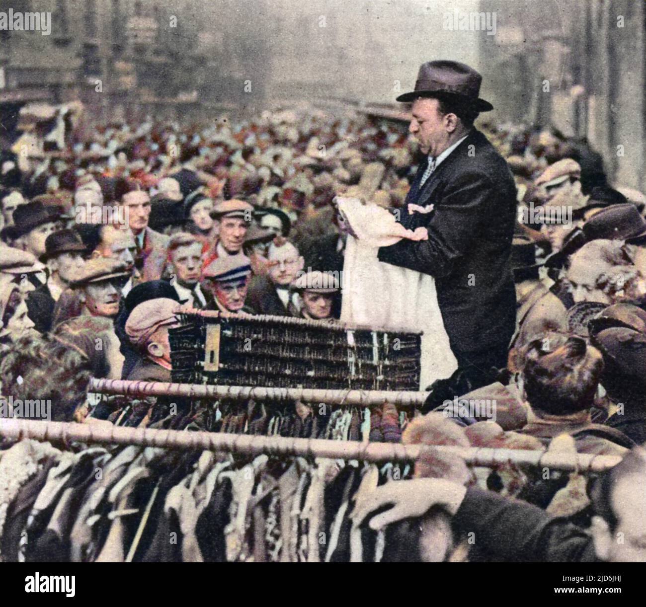 A market trader at Petticoat Lane on a Sunday morning, extolling the ...
