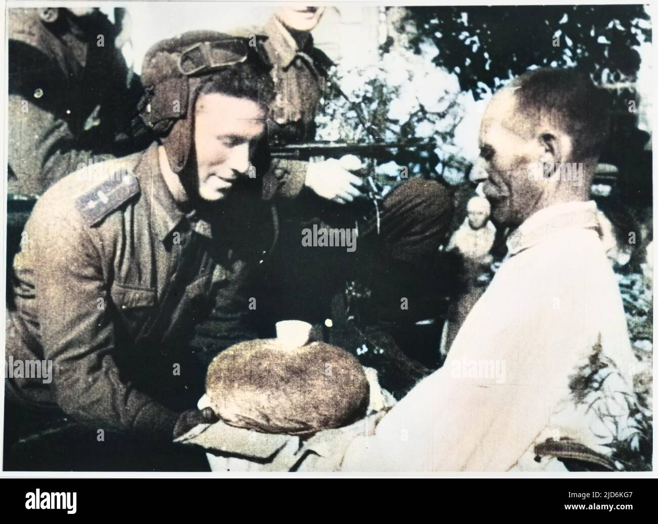 Ukrainian farmer greets a Soviet Tank crew with traditional gifts ...