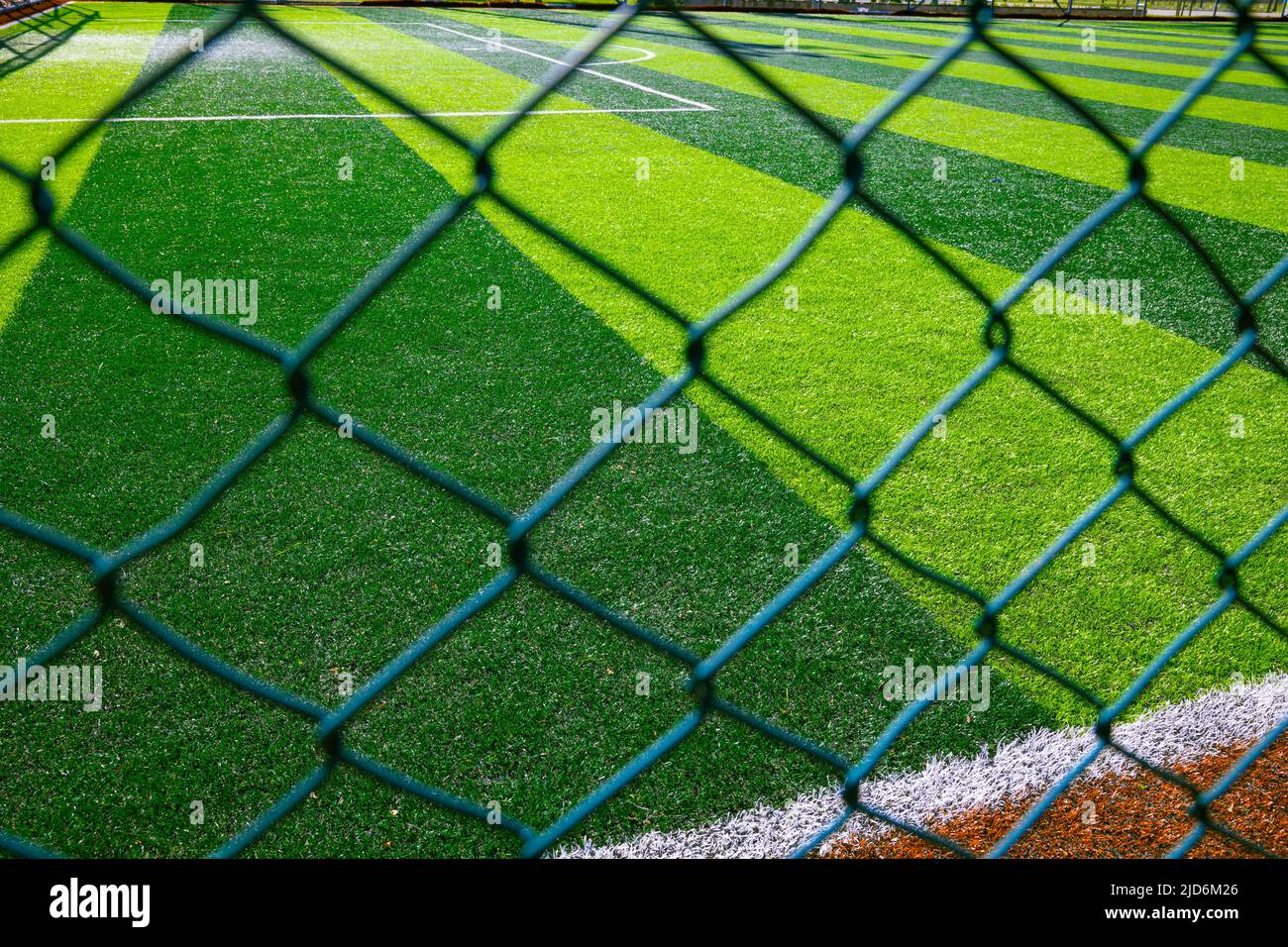 Empty soccer or football field behind the fences. Banned from football ...