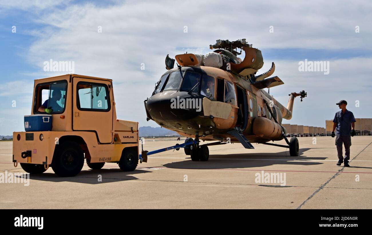 An Mi-17 helicopter is towed at Davis-Monthan Air Base, Arizona, June 9 ...