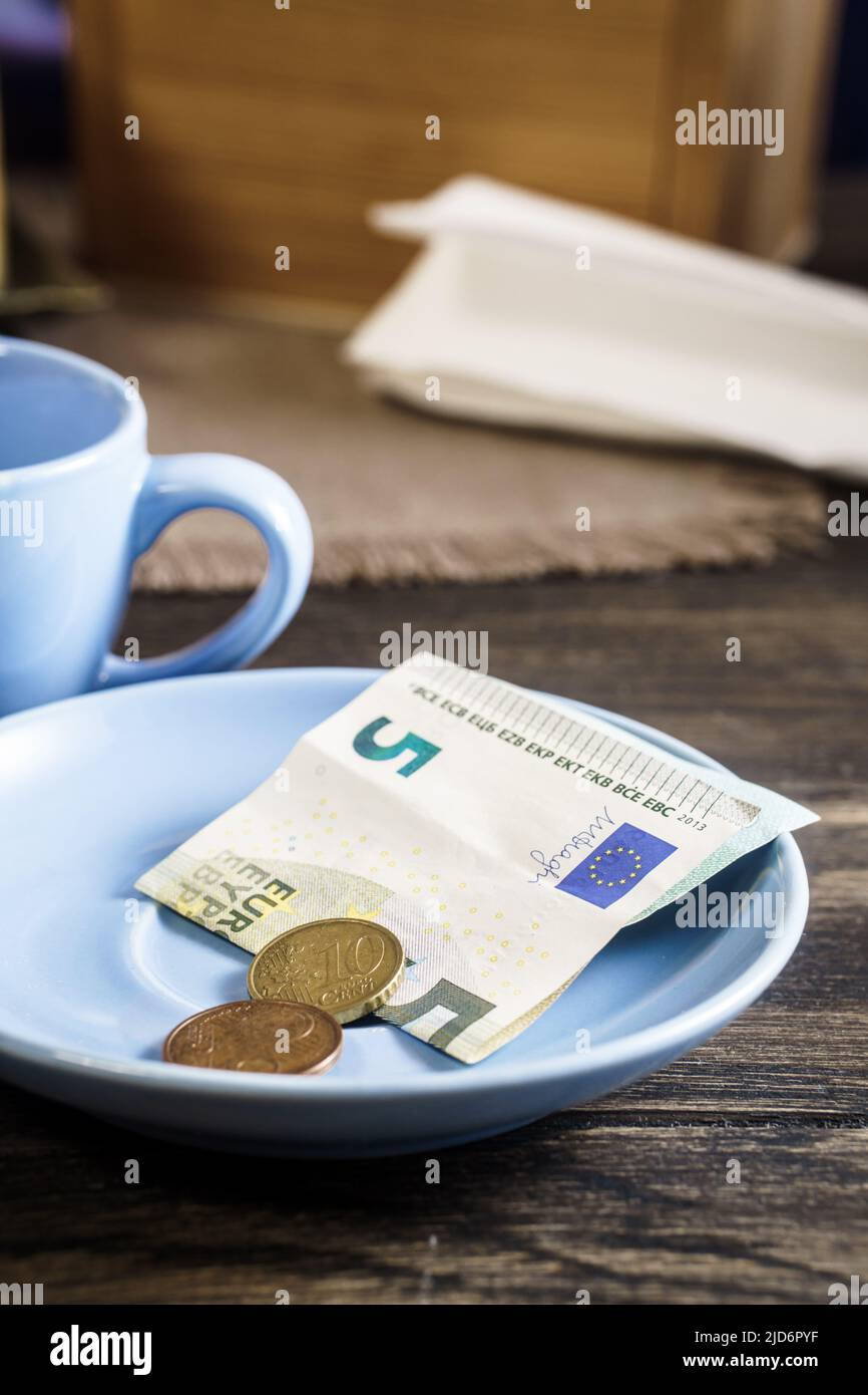 Giving gratuity hi-res stock photography and images - Alamy