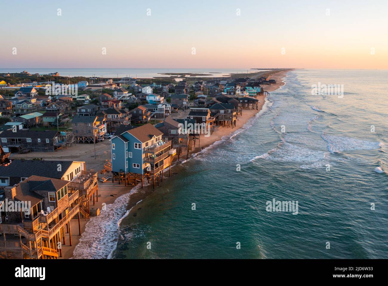 Aerial View of homes right on the shoreline in Buxton North Carolina ...