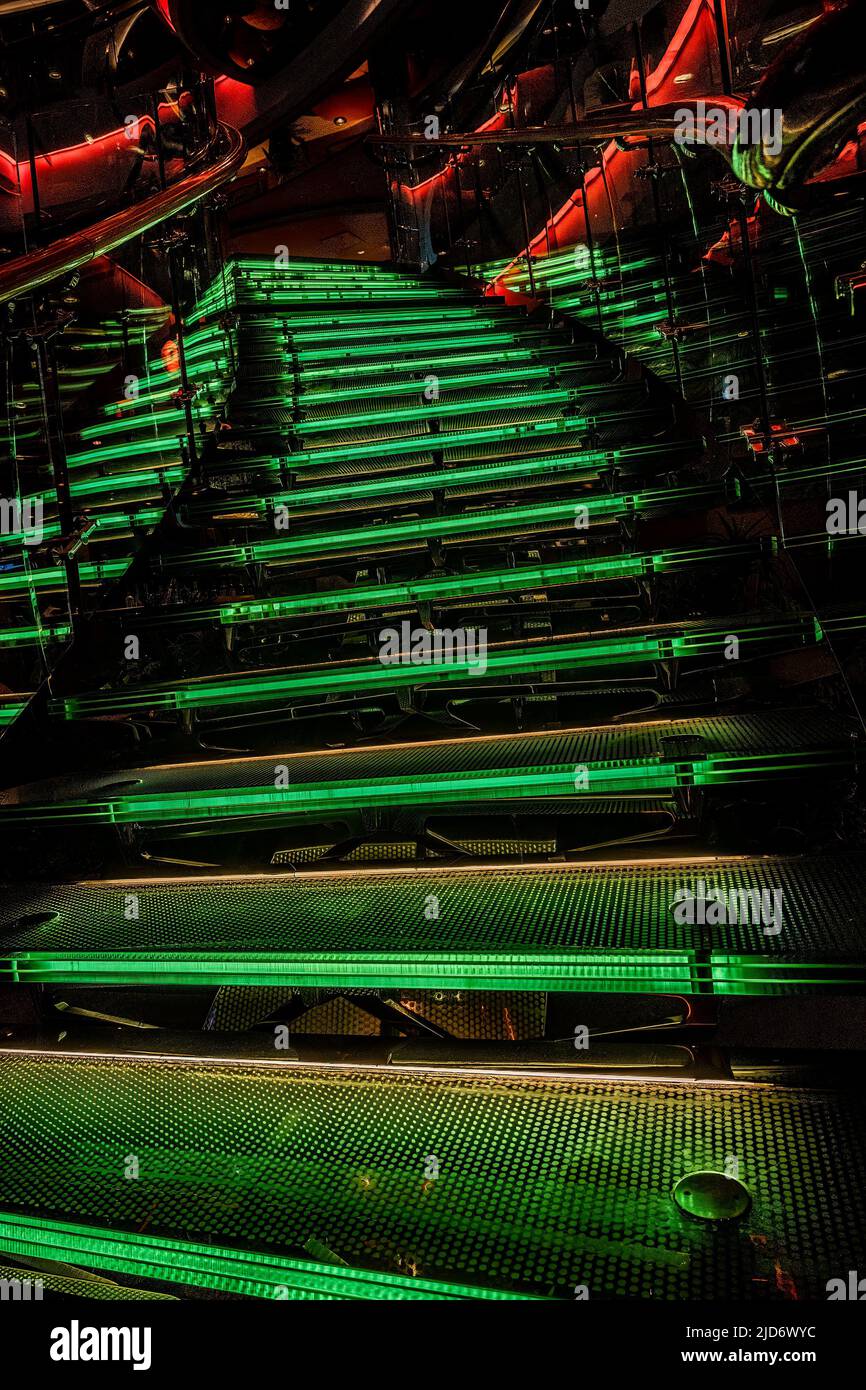 Green Neon Steps in Dark Lobby Stock Photo - Alamy