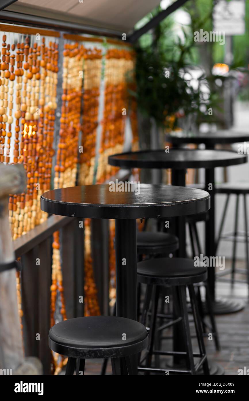 tables and chairs in a restaurant Stock Photo - Alamy