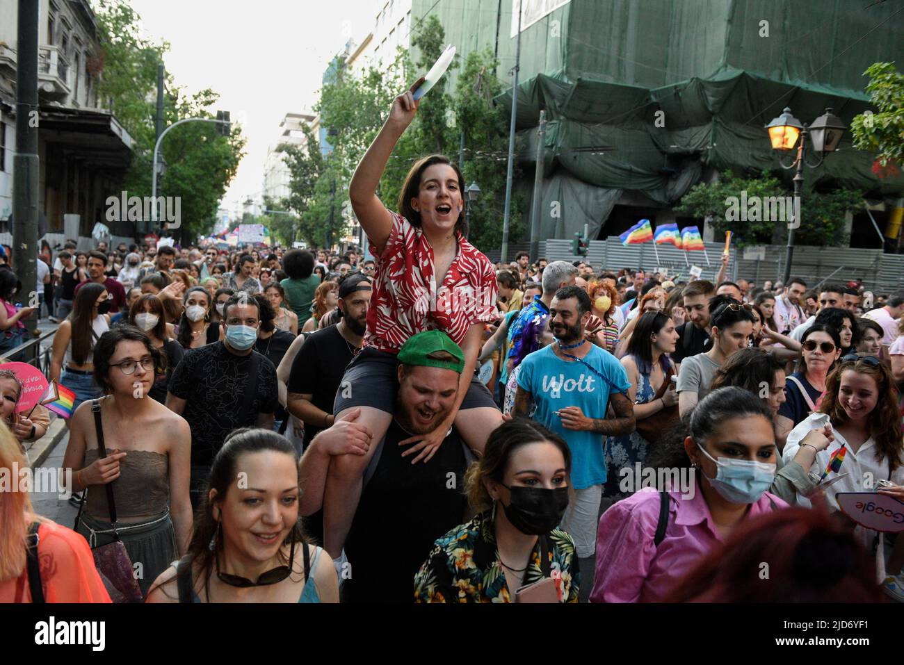 Athens, Greece. 18th June, 2022. People march waving rainbow flags and ...