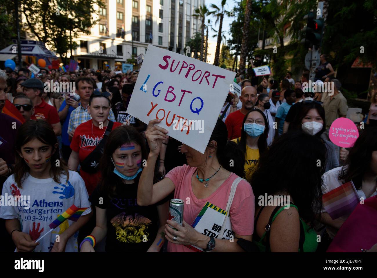 Athens, Greece. 18th June, 2022. People march waving rainbow flags and ...