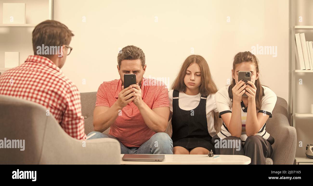 phone addicted father mother and child at family psychologist ...