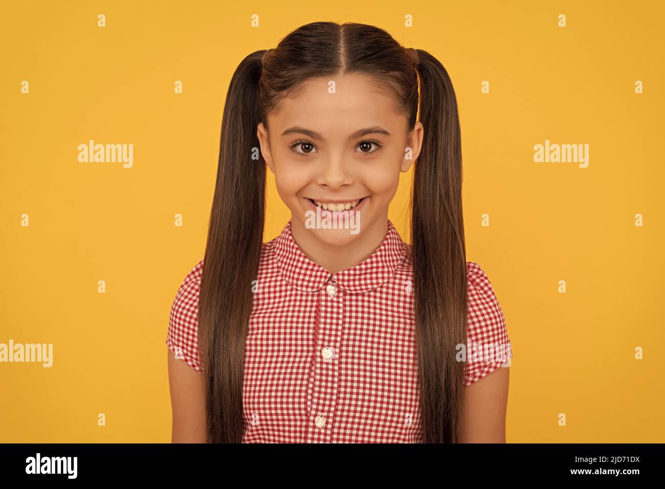 Innocent girl child happy smiling yellow background, girlhood Stock ...