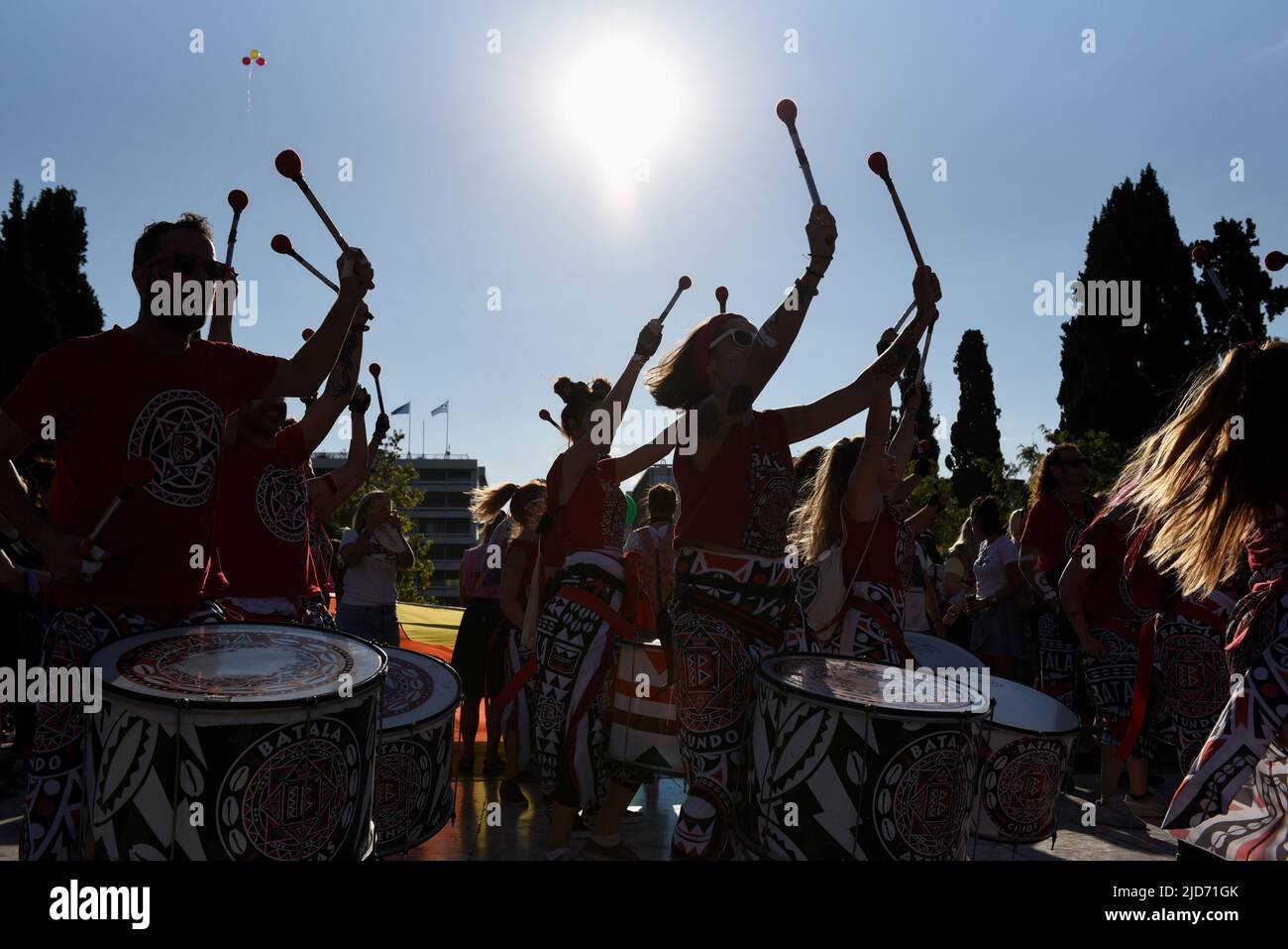 Athens, Greece. 18th June, 2022. People march waving rainbow flags and ...