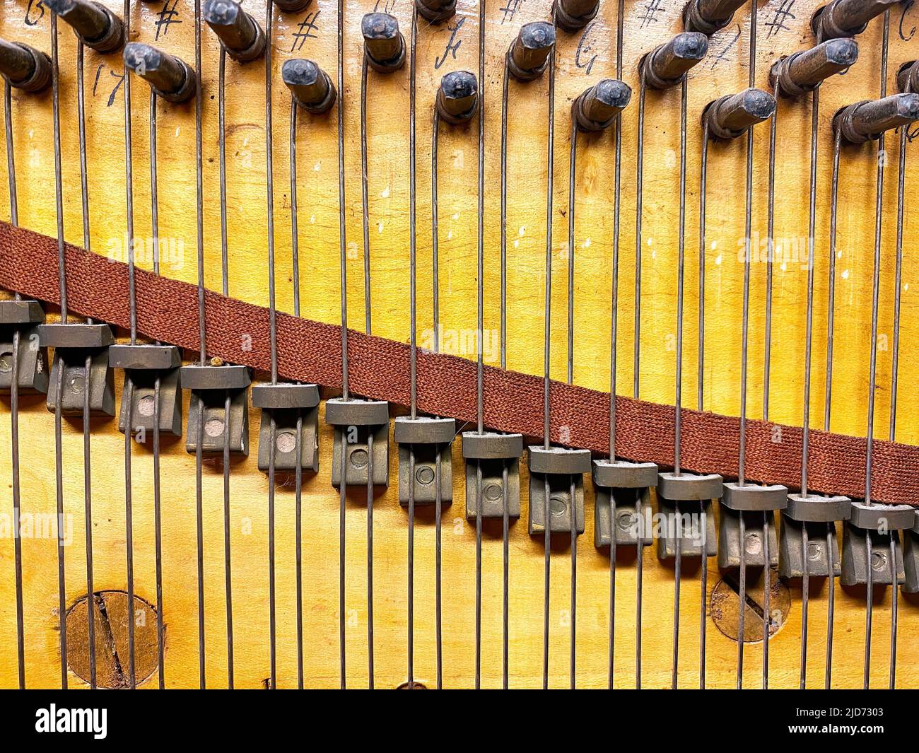 Strings inside vintage wooden piano Stock Photo - Alamy