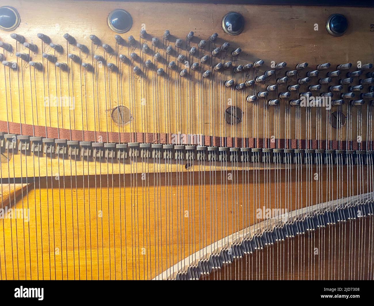 Strings inside vintage wooden piano Stock Photo - Alamy