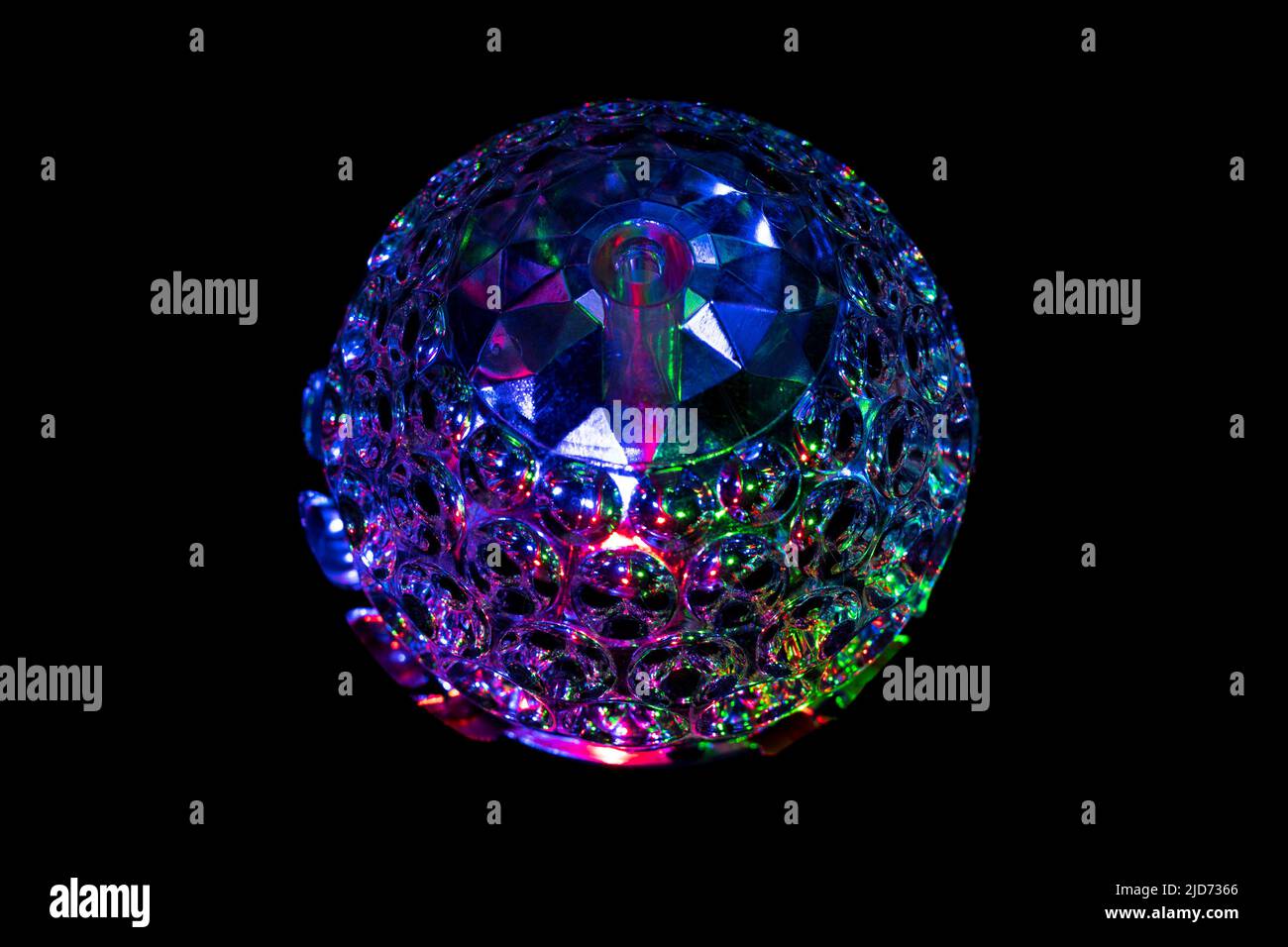 Colored ball in dark. Light music. Decoration of color. Color lamp ...