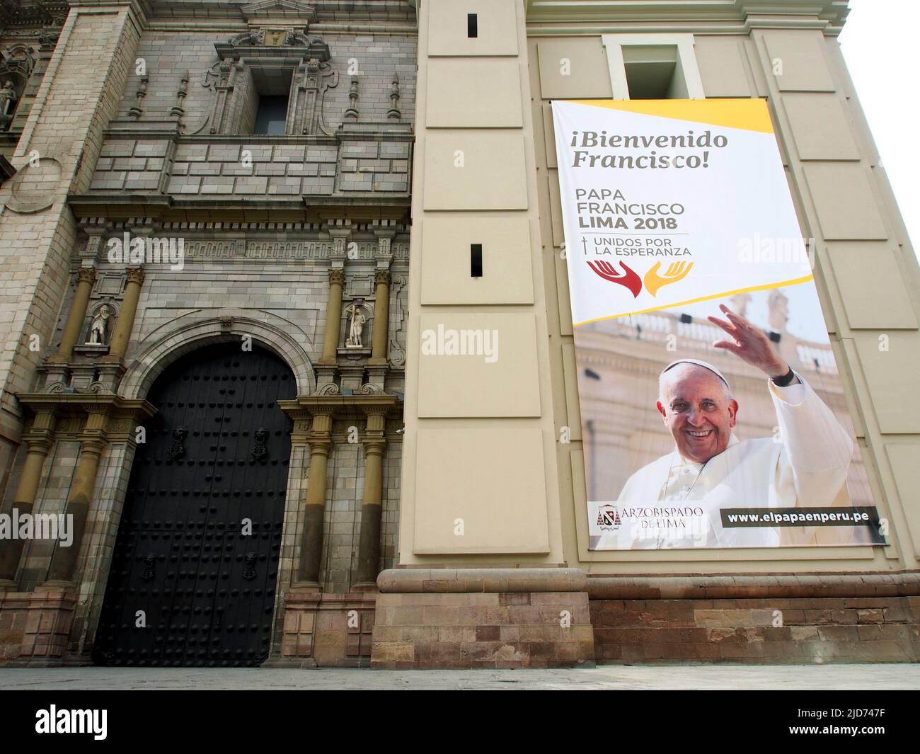 Facade of the cathedral of Lima showing Pope Francis banner who will ...