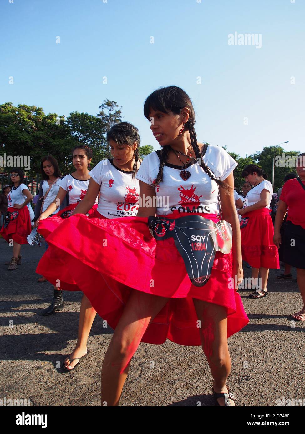 On International Women's Day; Thousands of girls, some wearing red ...