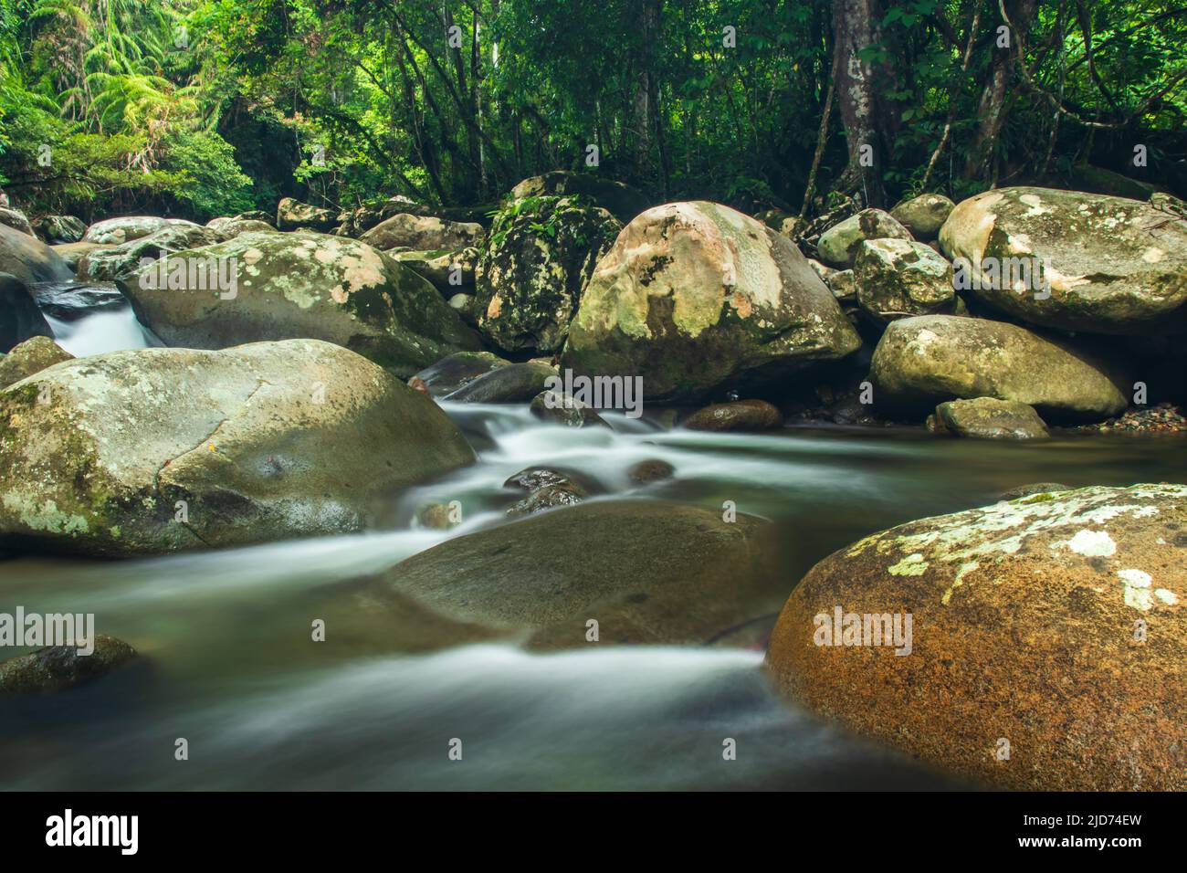 Photo of water flowing between rocks, Mountala river, Aceh, Indonesia ...
