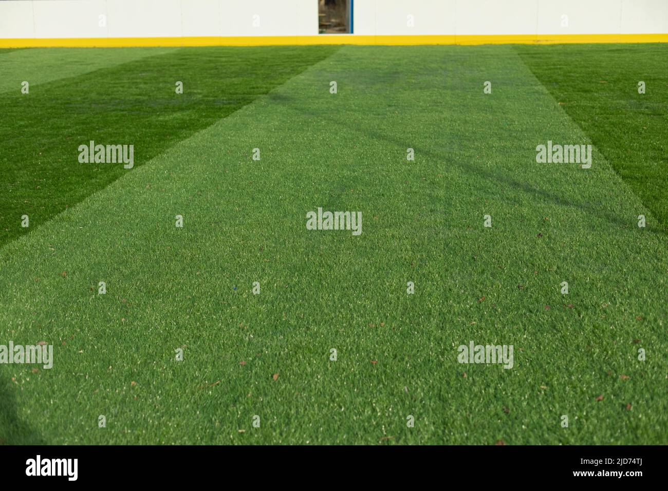 Lawn on football field. Artificial coating on sports ground. Green ...