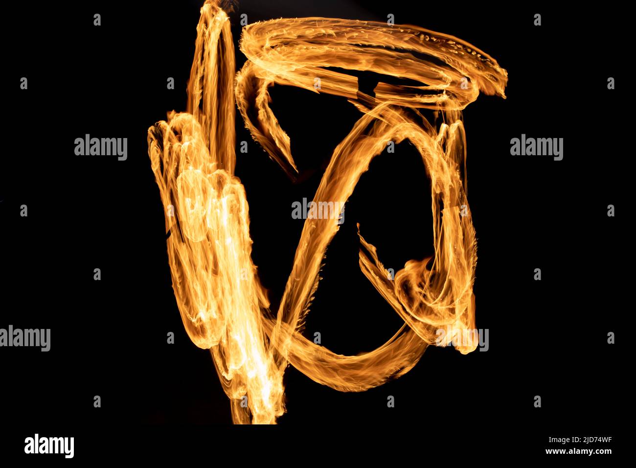 Lines of fire on black background. Flames in dark. Shoot torsion of ...