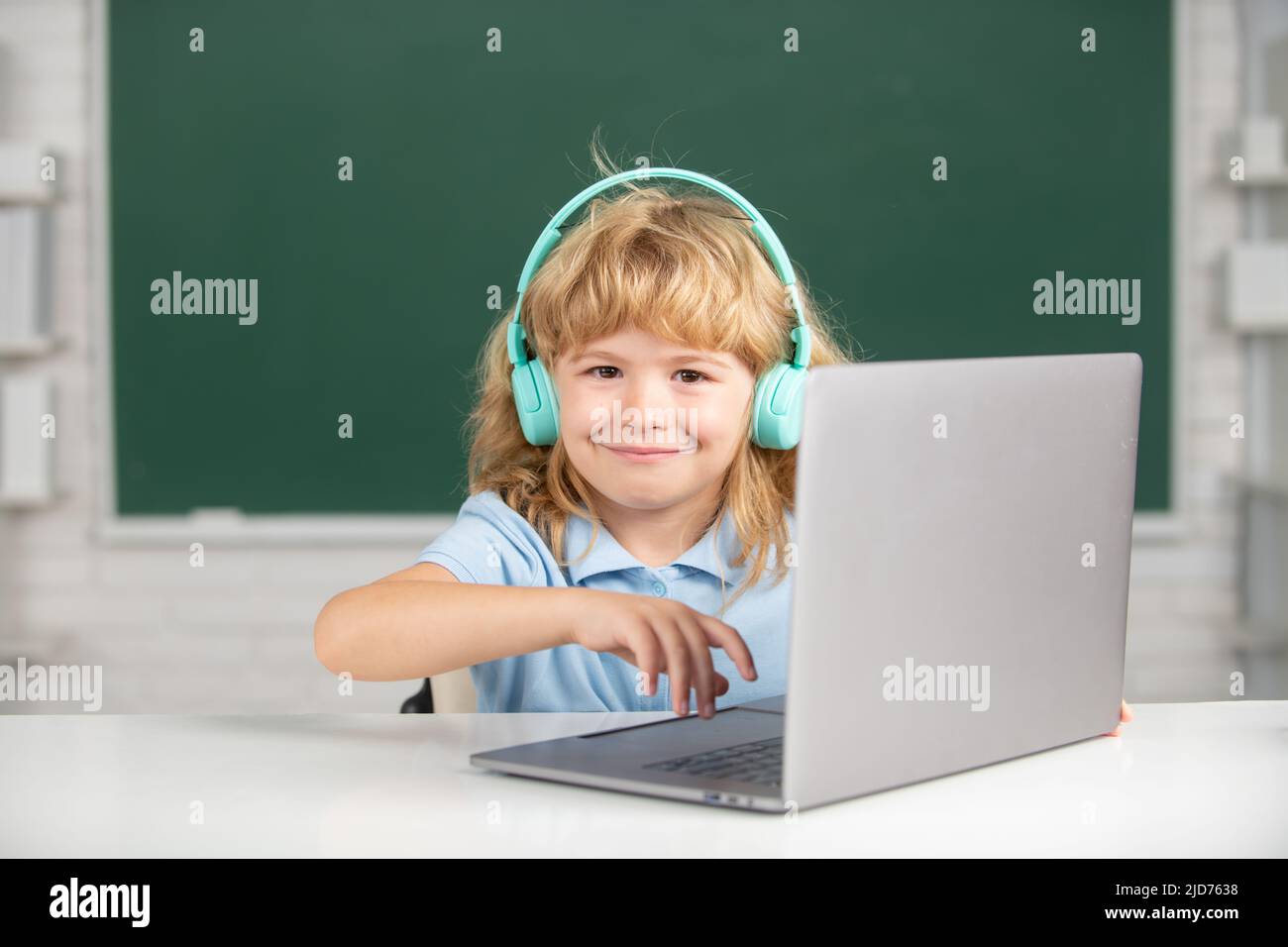 Student using headphone in classroom hi-res stock photography and ...