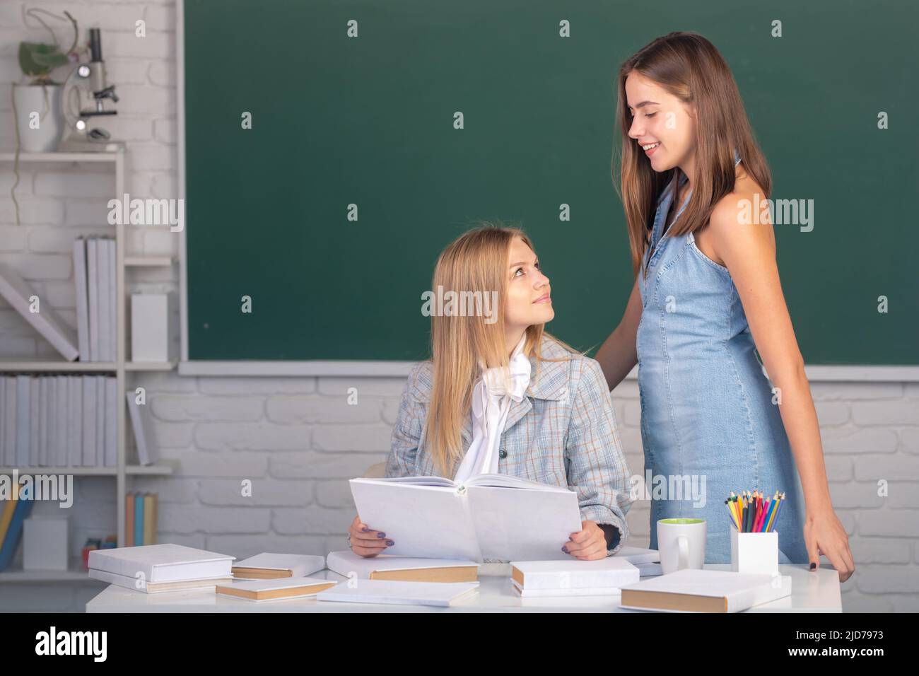 Students girls in classroom at school college or university Stock Photo ...
