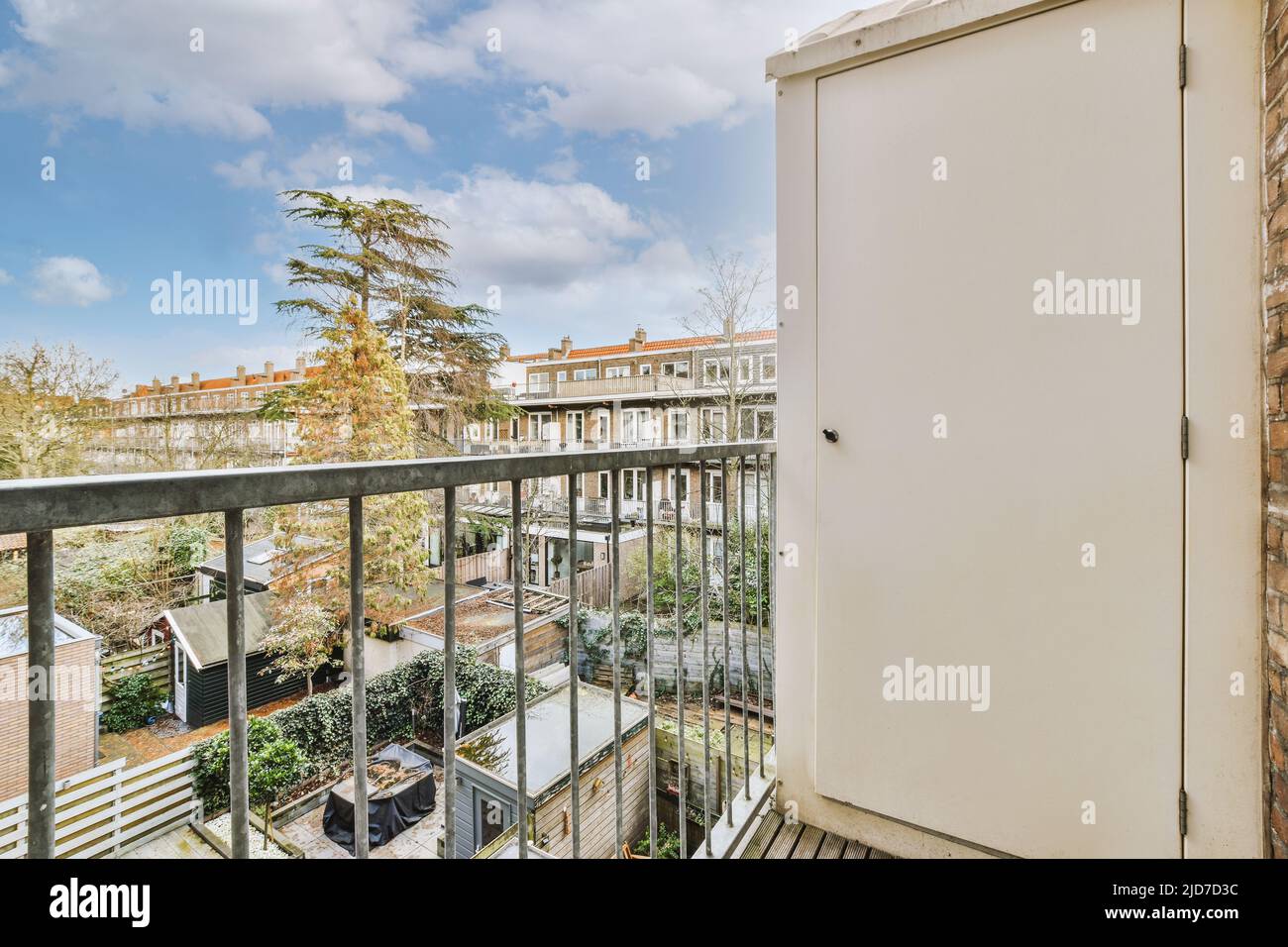 Panoramic view of the old brick buildings and courtyard with trees from ...