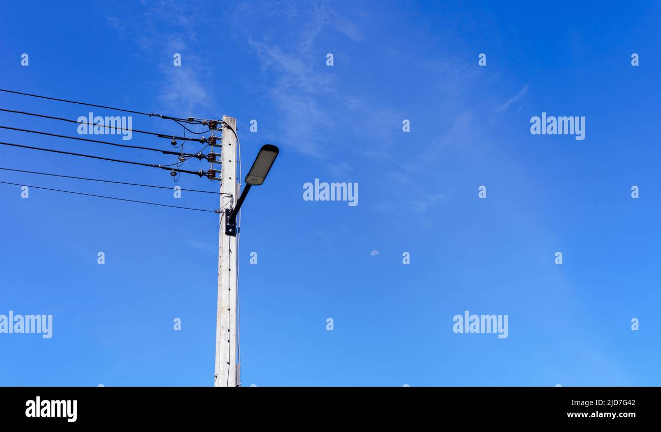 electric pole with light panel led bulb sky background Stock Photo - Alamy