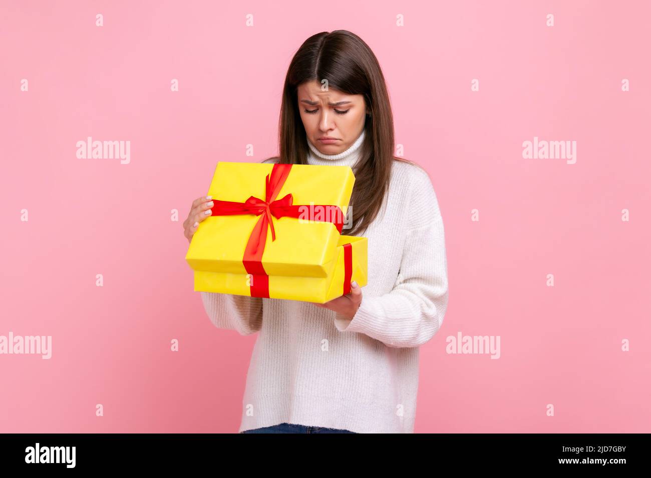 Birthday present open unhappy hi-res stock photography and images - Alamy
