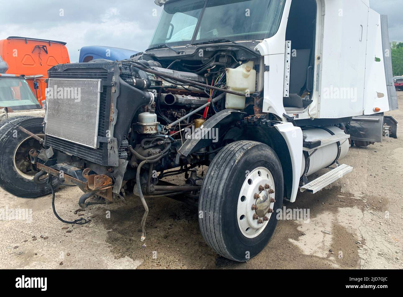 Big external damage of truck, wrecked bumper and car fender missing ...