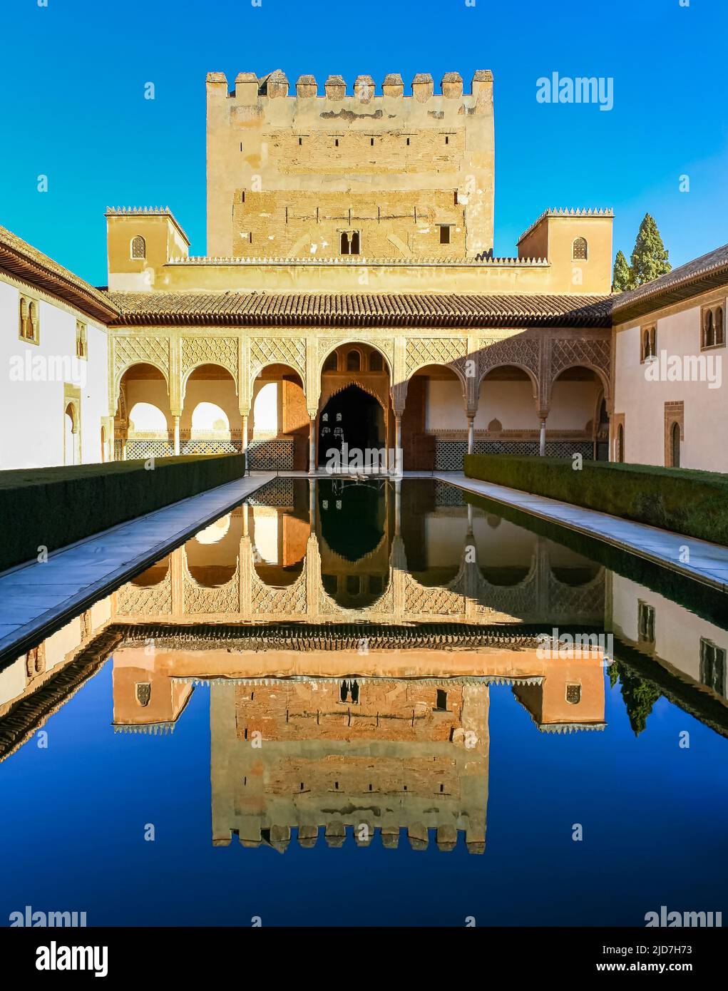 Palace of ancient Islam with fountains, arches and reflections in the ...