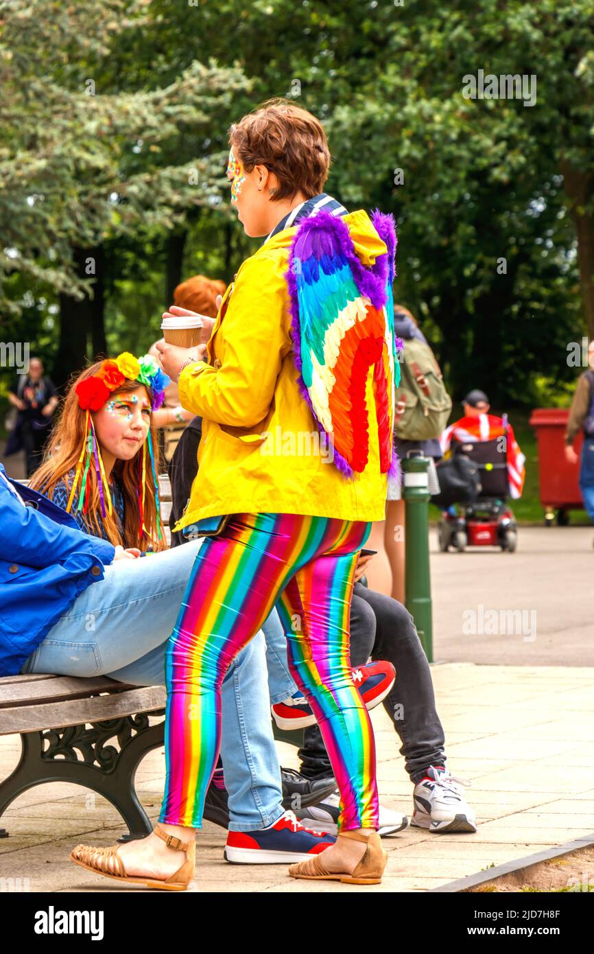 woman wearing feather rainbow wings Stoke Gay Pride event in Hanley ...