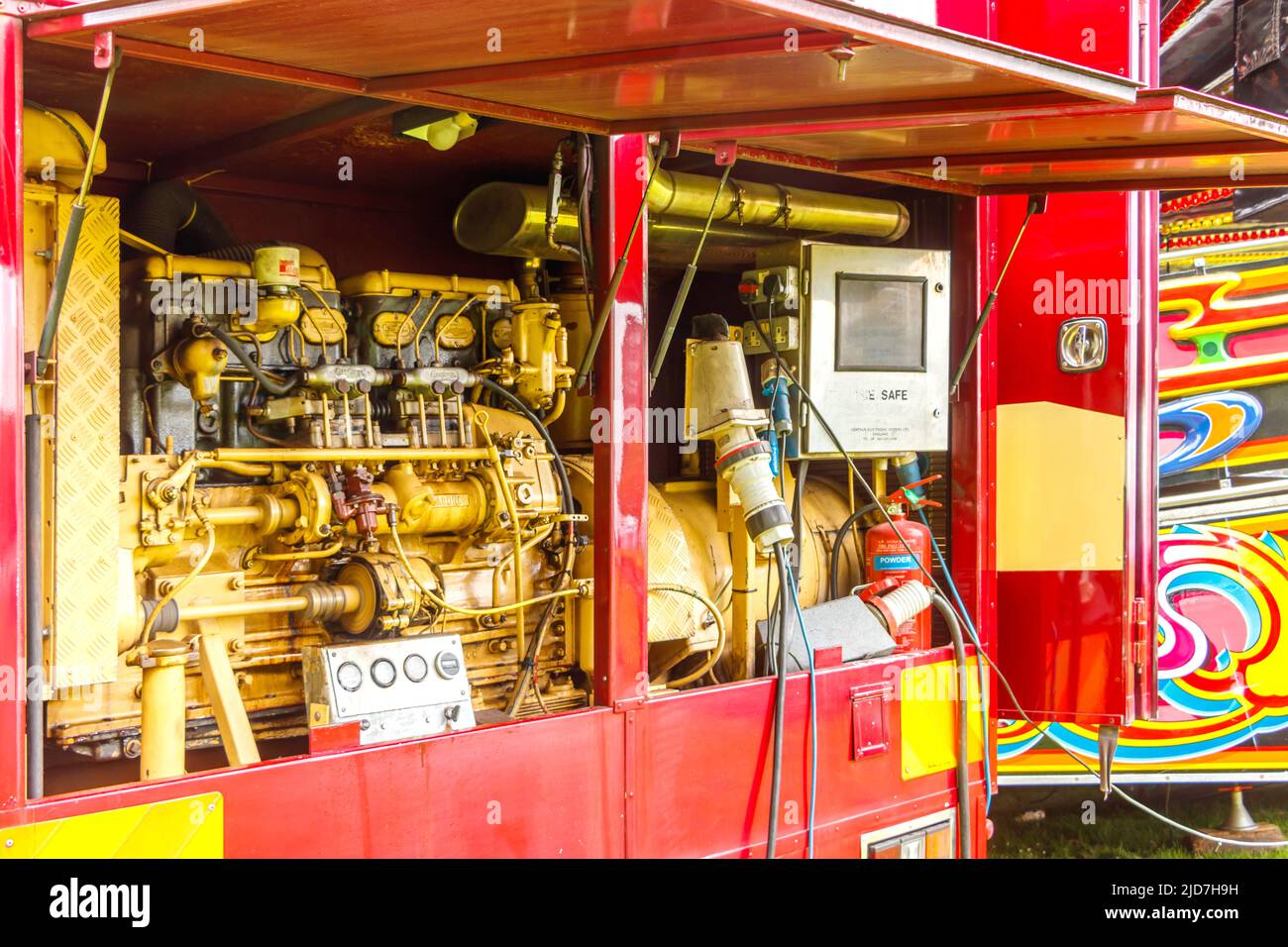 close up detail of Foden generator truck lorry with fairground rides at ...