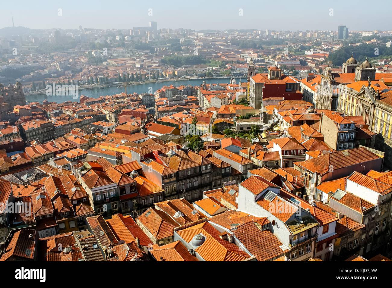 typical Porto houses next to the Douro River, picturesque architecture ...