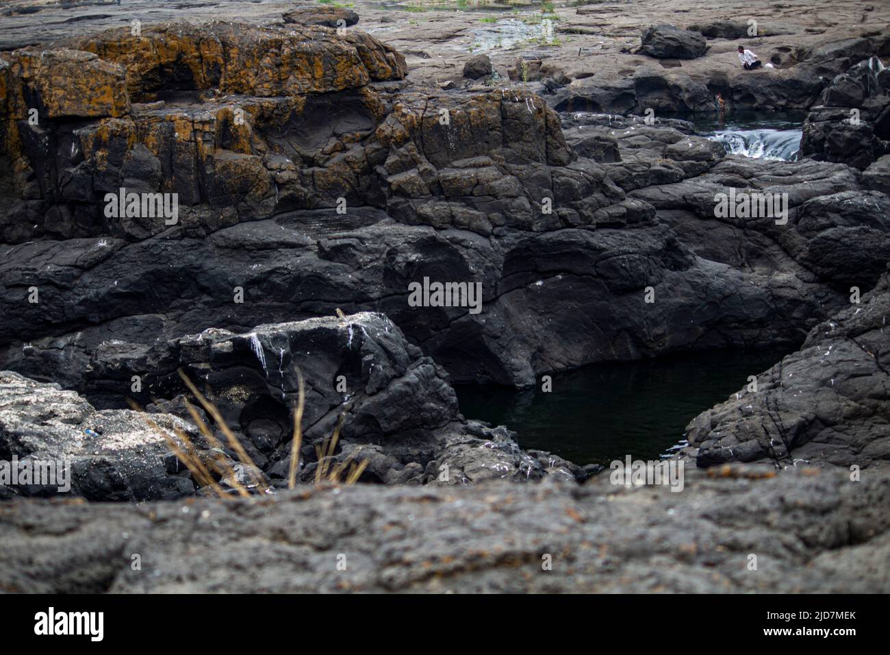 Rock formation, River side stones in water Stock Photo - Alamy