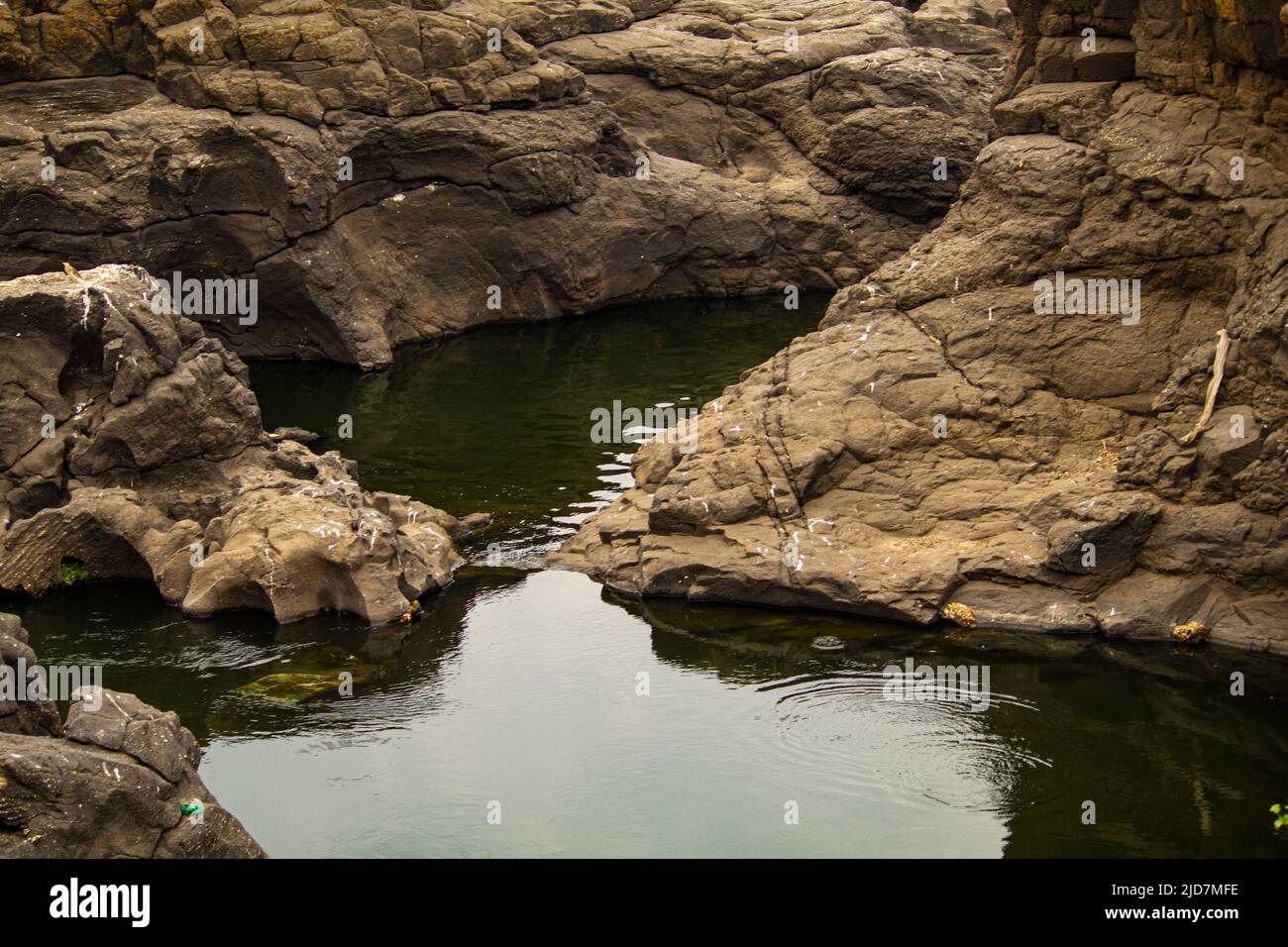 Rock formation, River side stones in water Stock Photo - Alamy