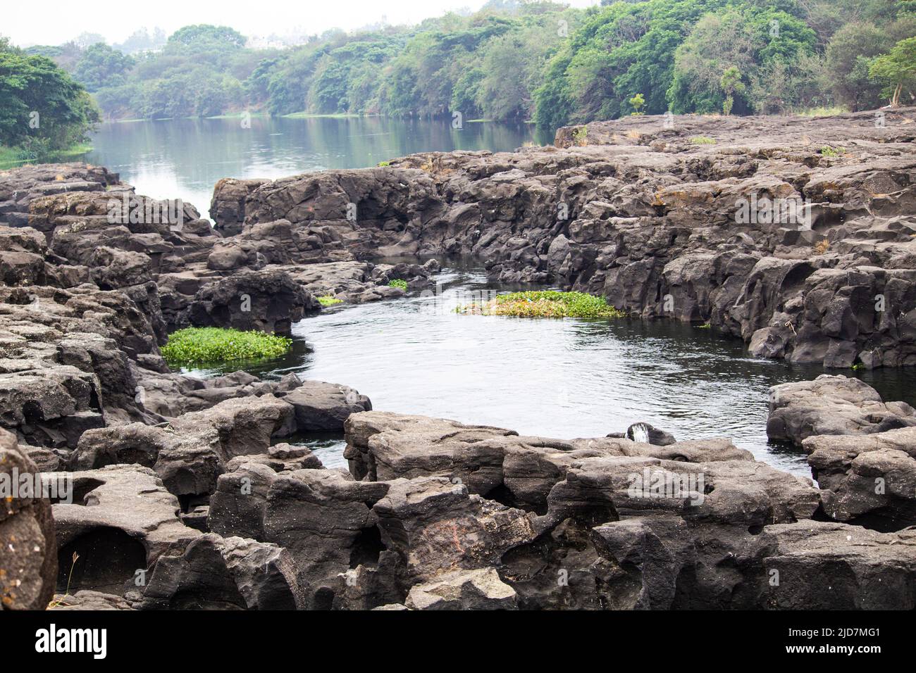 Rock formation, River side stones in water Stock Photo - Alamy