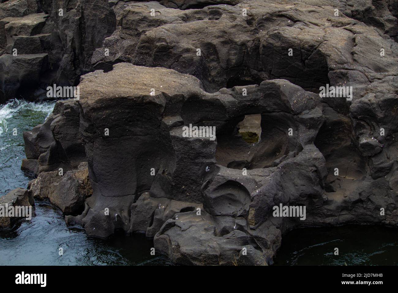 Rock formation, River side stones in water Stock Photo - Alamy