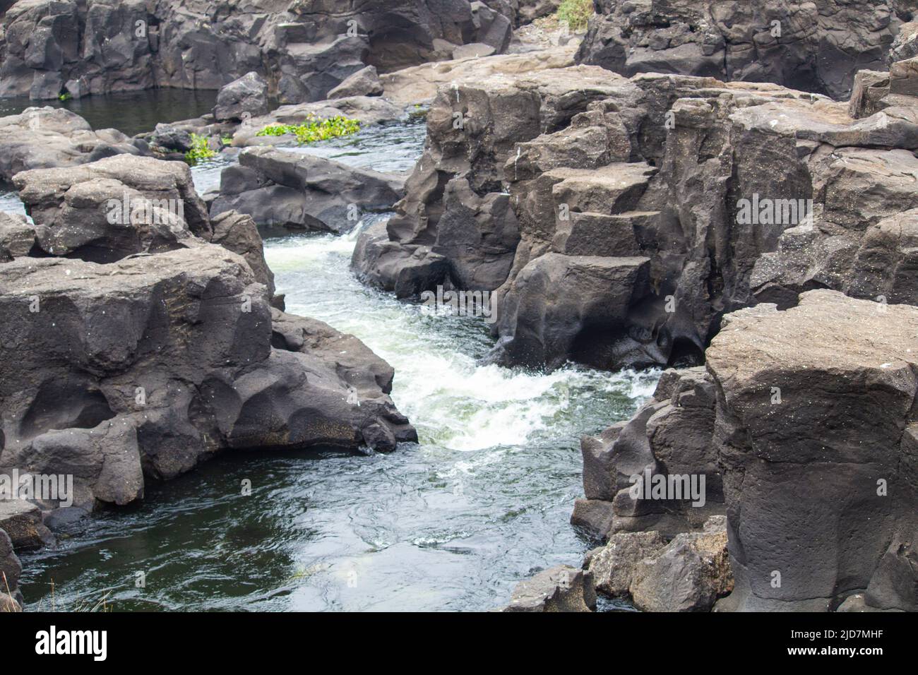 Rock formation, River side stones in water Stock Photo - Alamy