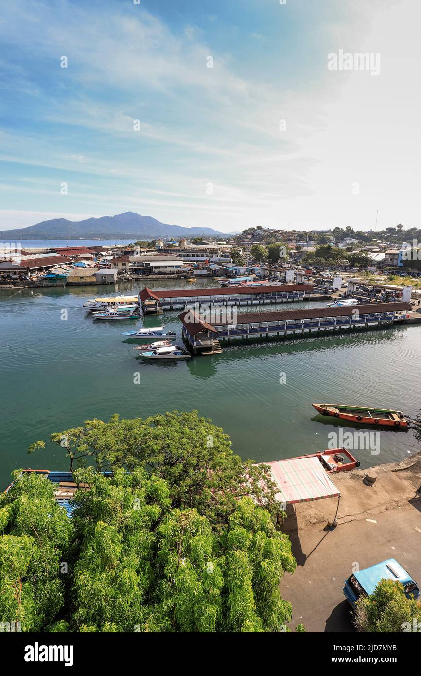 Wharves & boats at the busy port of this provincial capital in the far ...