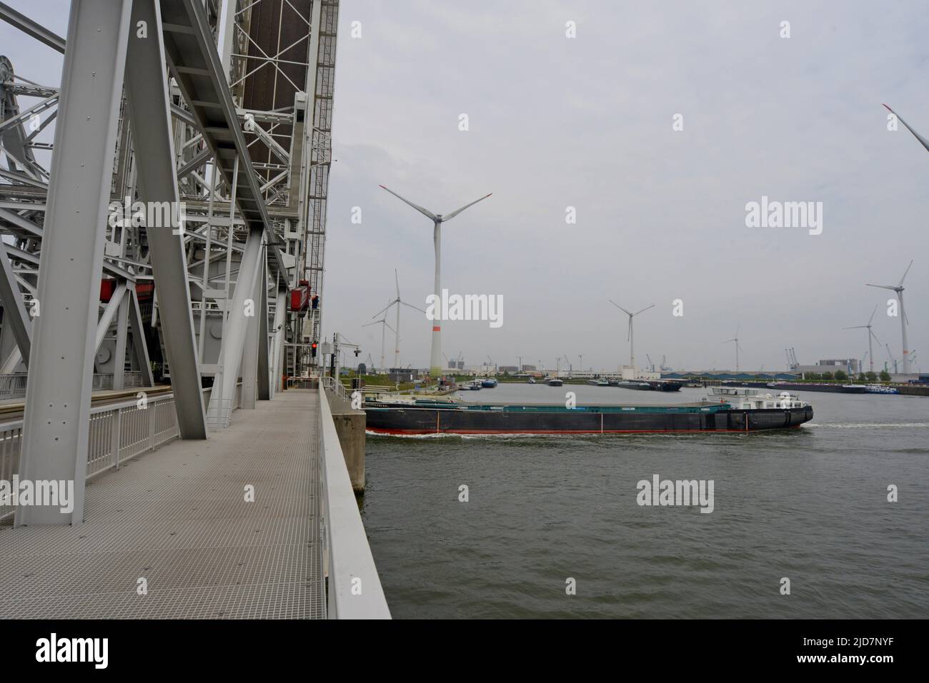 A bulk cargo carrying barge leaves the Port of Antwerp, Belgium ...