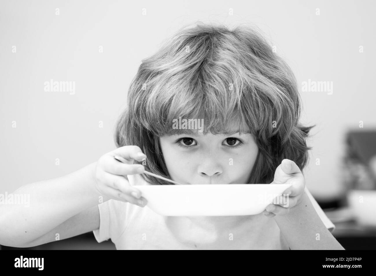 Laughing at dining table Black and White Stock Photos & Images - Alamy