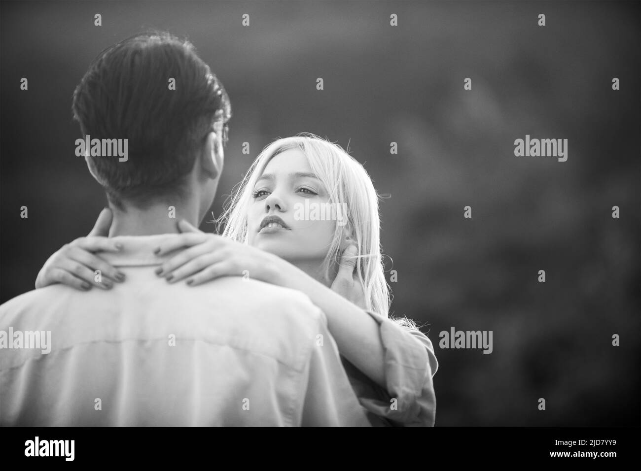 Young lovers hugging and embracing. Couple lovers hugging and kissing ...