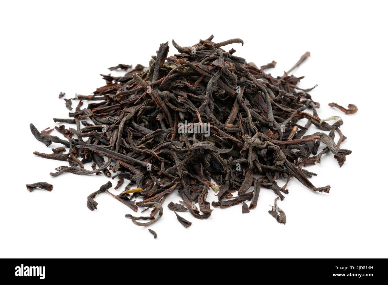 Heap of dried Ceylon blend tea leaves close up isolated on white ...