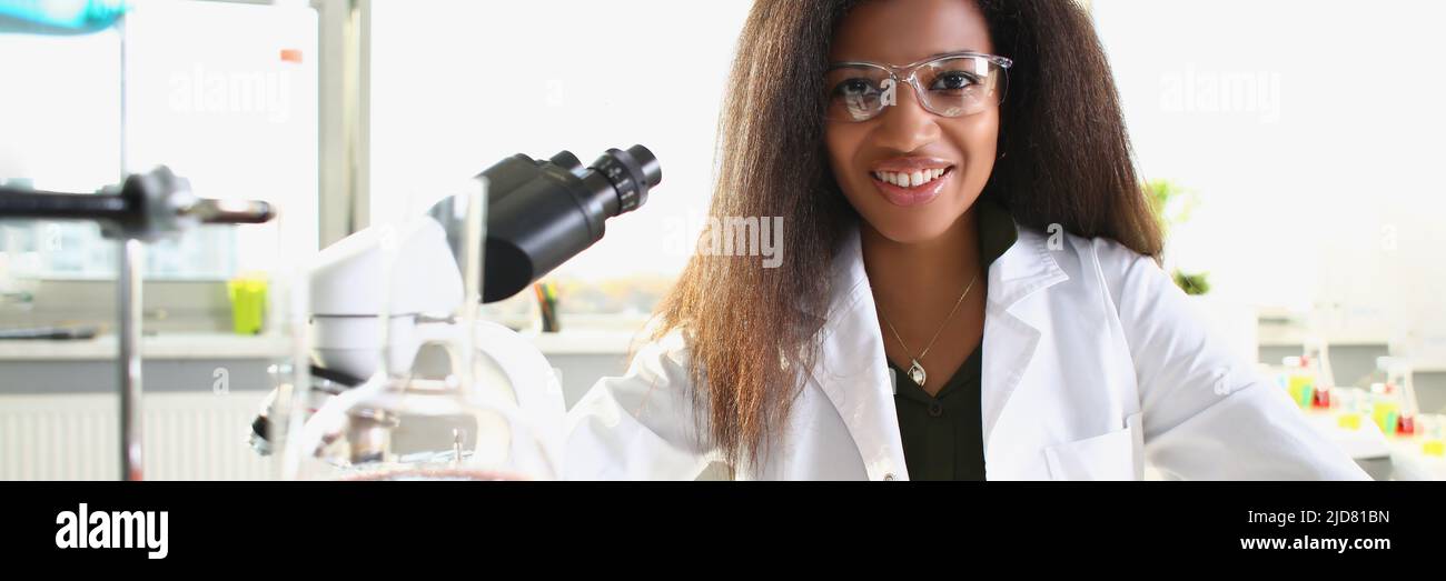 Black young woman biologist in the laboratory, close-up Stock Photo - Alamy