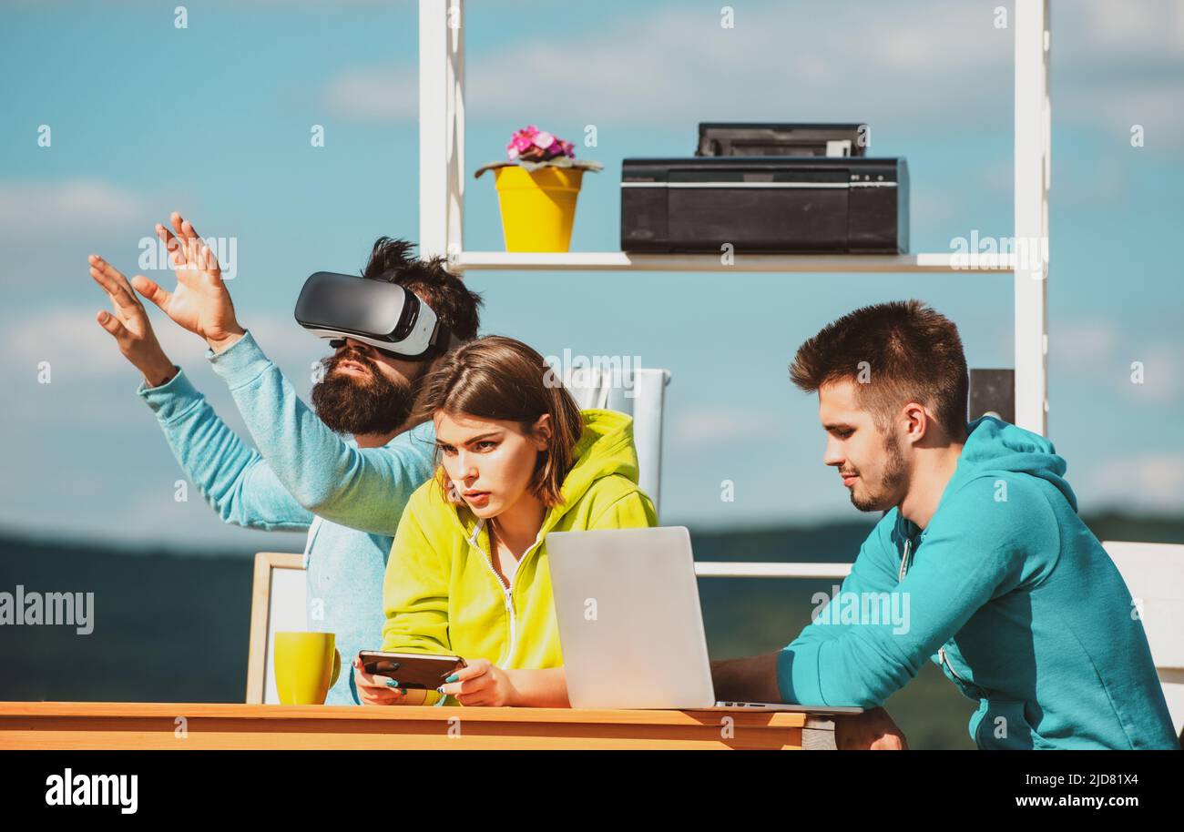 Business people working with virtual reality glasses during a business ...