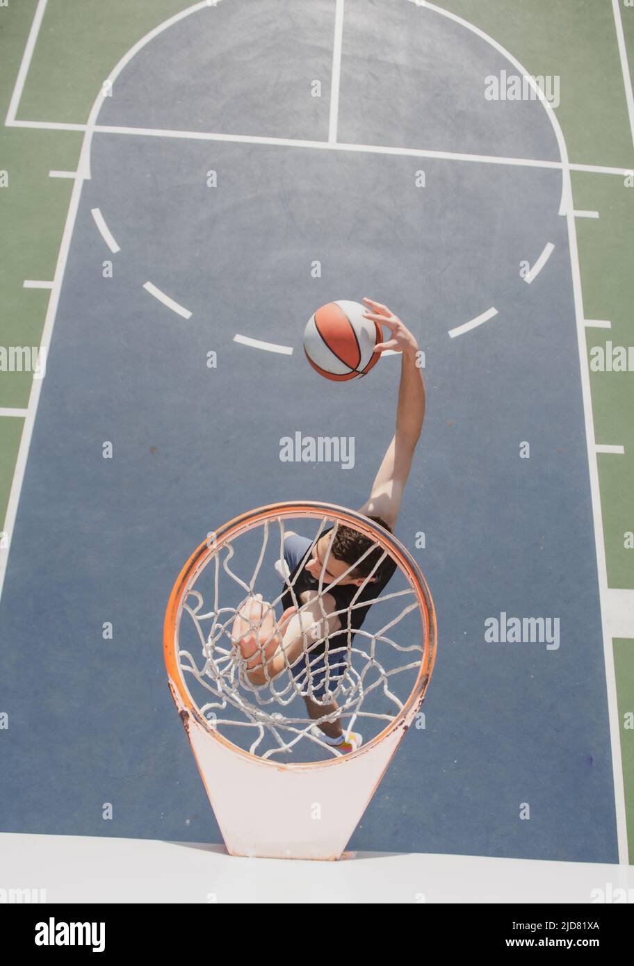 Caucasian basketball player of team in action, motion in jump. Concept ...