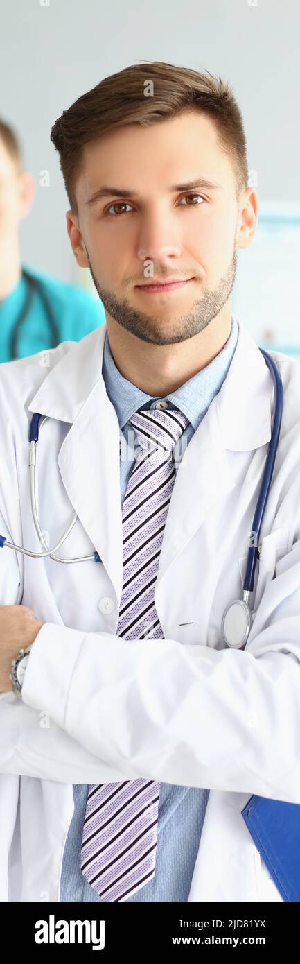 Two male medical workers in uniform at the workplace Stock Photo - Alamy
