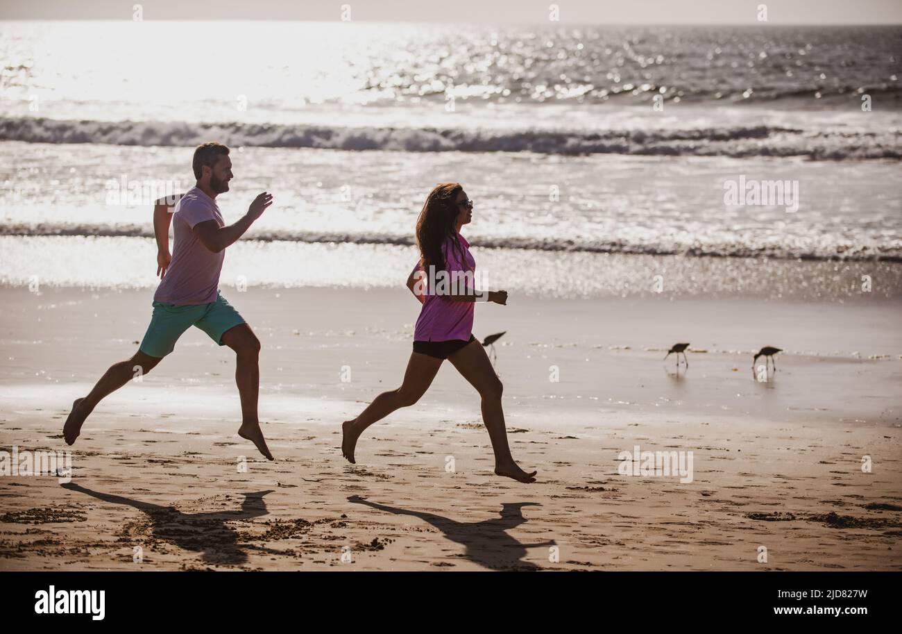 Sport runners jogging on beach working out. Fitness exercise outdoors ...