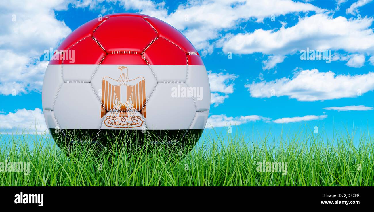 Soccer ball with Egyptian flag on the green grass against blue sky, 3D ...